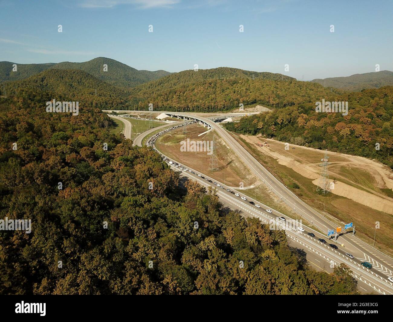 Aerial view of the rural highway during autumn season Stock Photo - Alamy