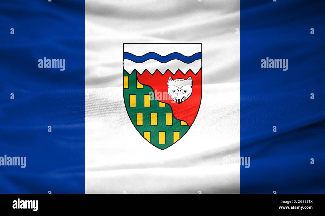 Realistic flag of Northwest Territories on the wavy surface of fabric ...