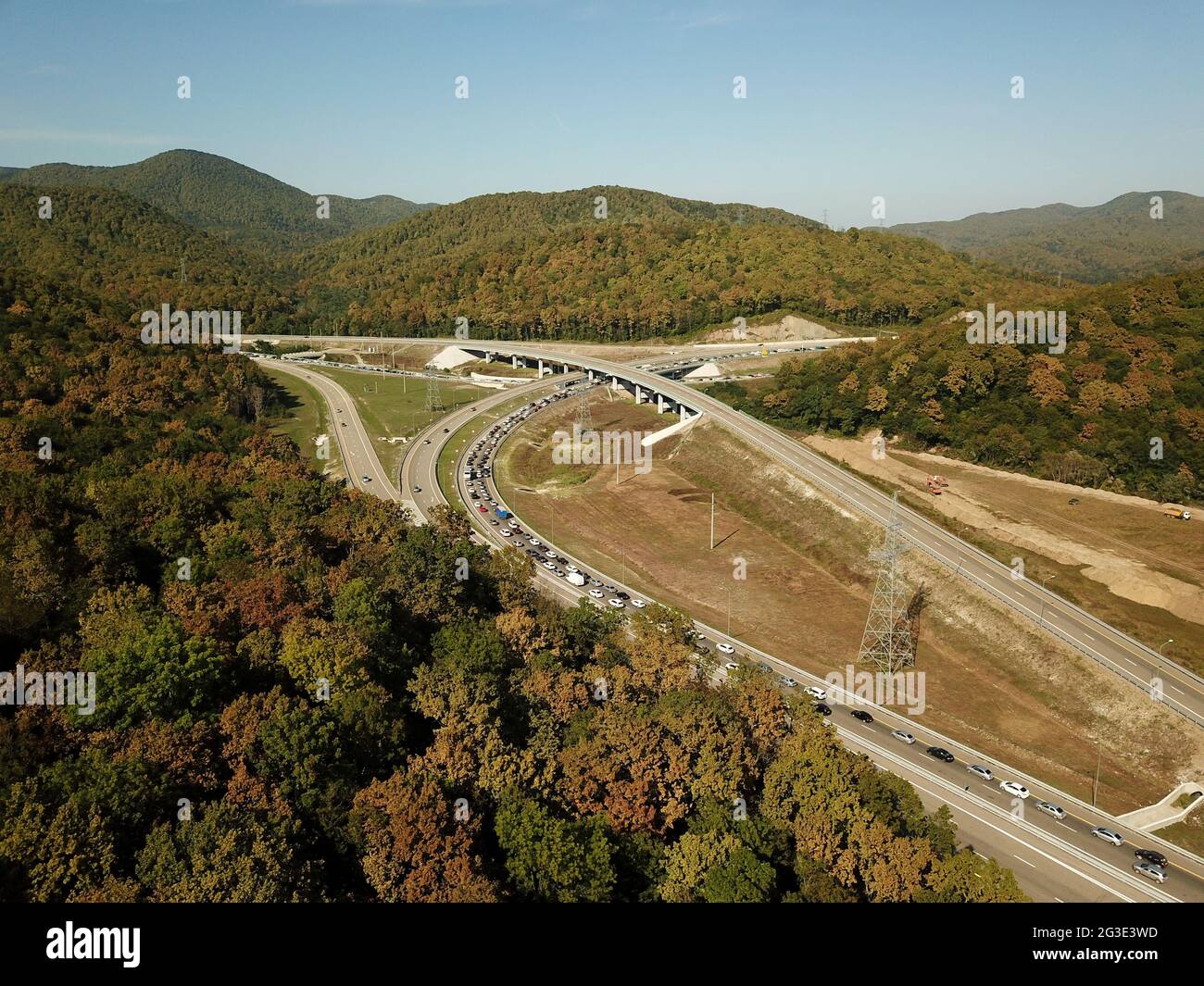 Aerial view of the rural highway during autumn season Stock Photo - Alamy