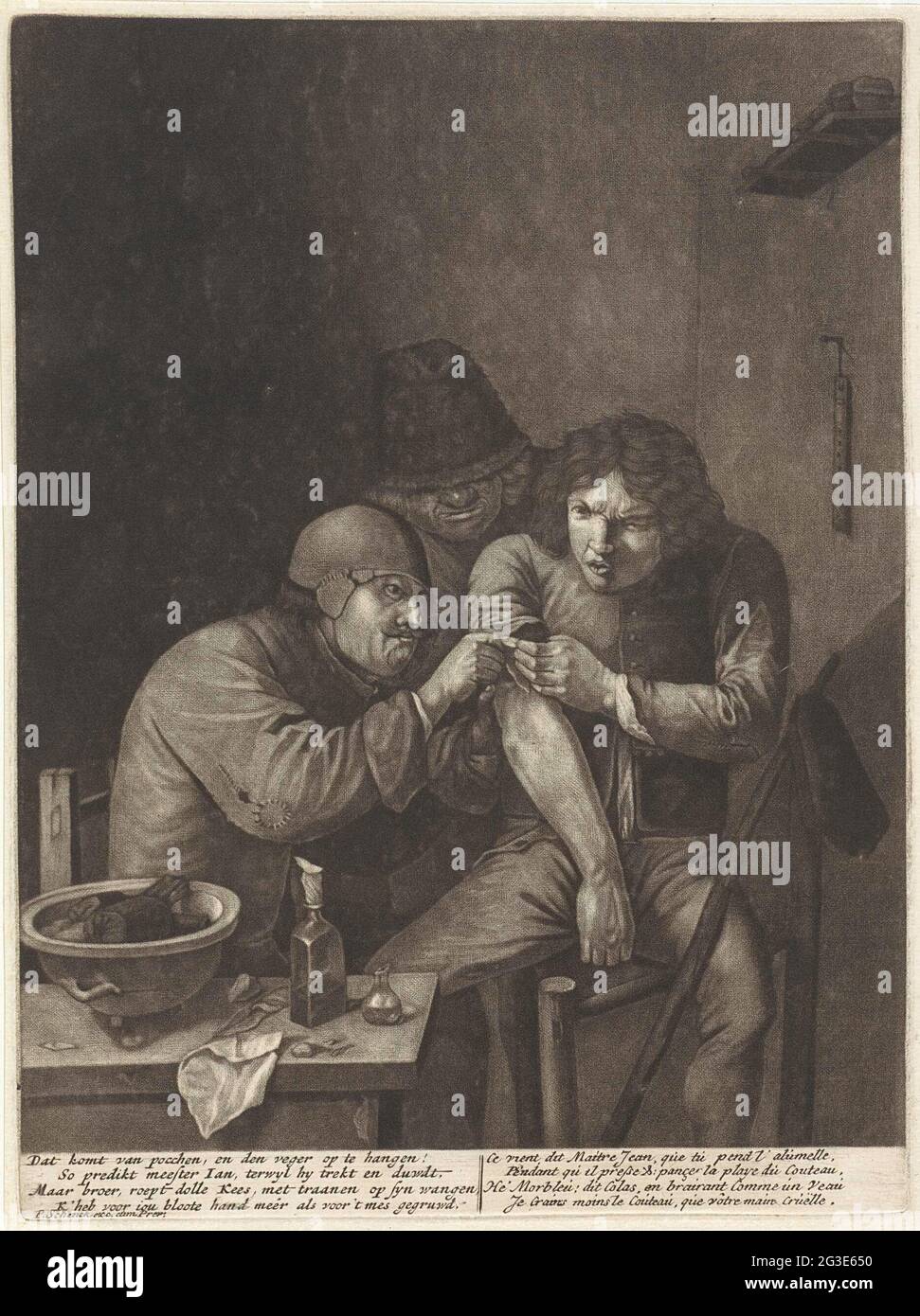 Arm surgery. A man is operated on his upper arm. He draws a pained face ...