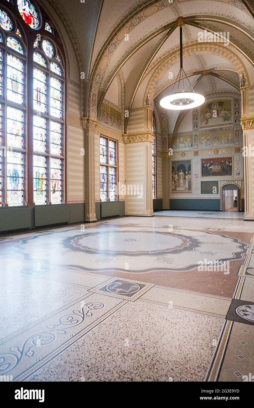 Eastern wall front hall with stained glass windows and mosaic floor ...