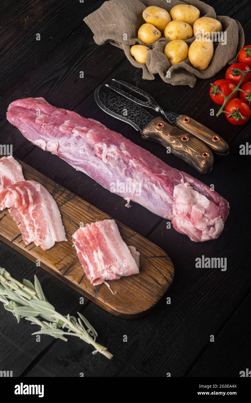 Organic pork fillet with ingredients and herbs for grill or baking ...