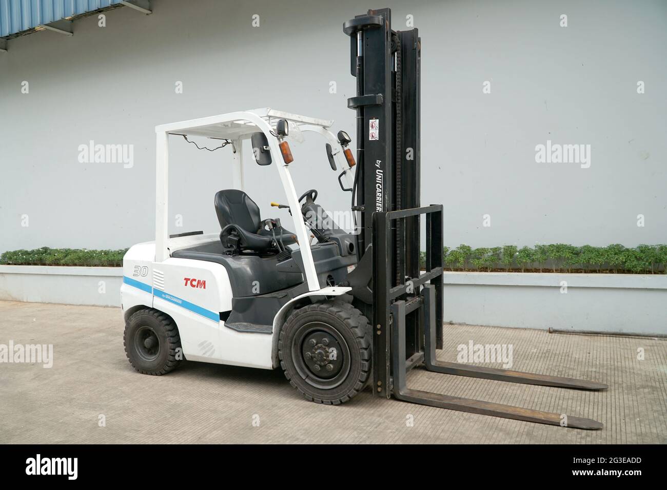 Forklift car in a warehouse, industrial area Stock Photo - Alamy