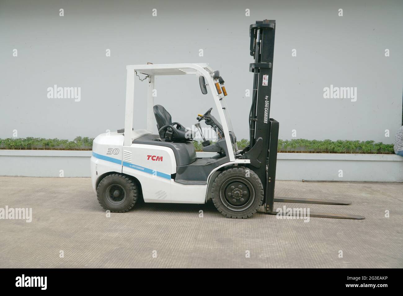 Forklift car in a warehouse, industrial area Stock Photo - Alamy