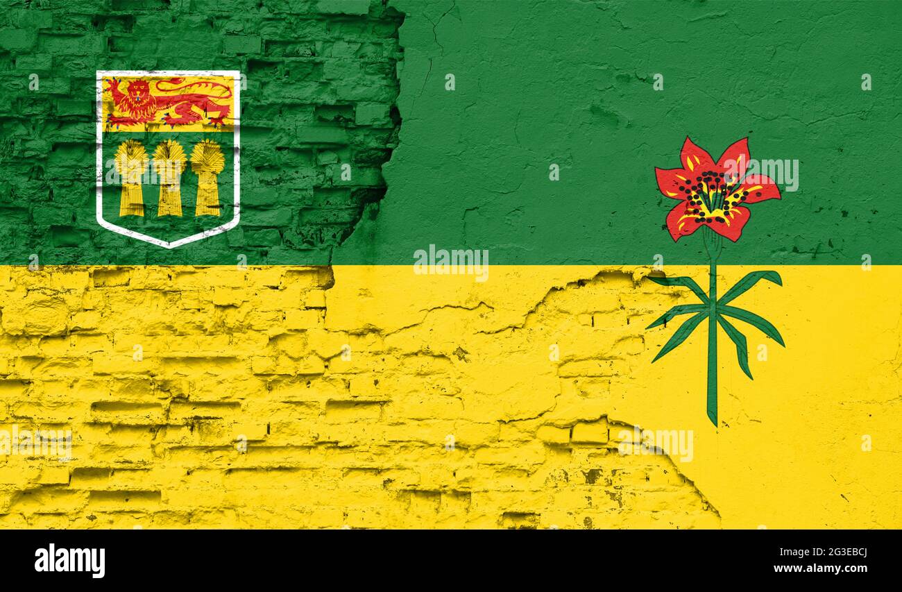 Saskatchewan flag is painted onto an old brick wall Stock Photo - Alamy