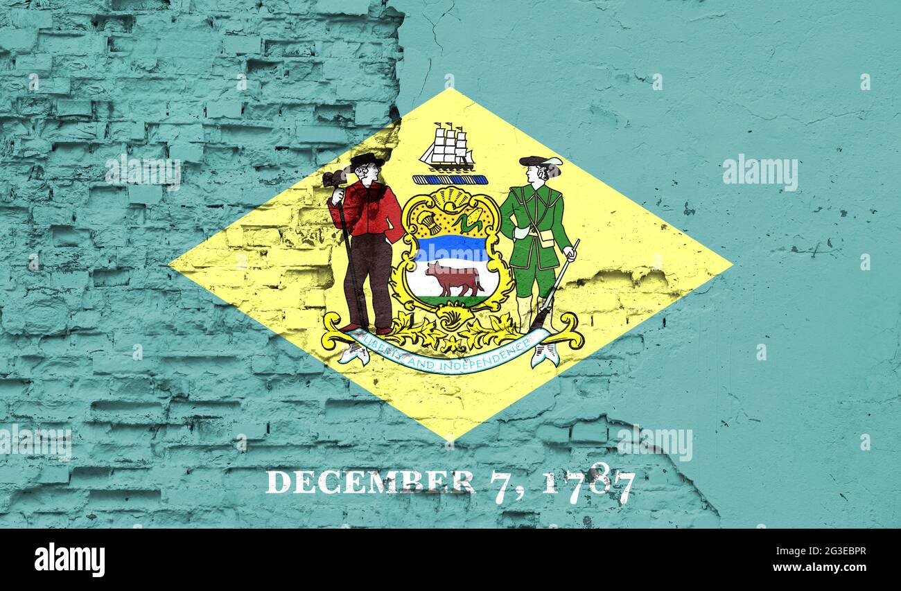 State of Delaware flag is painted onto an old brick wall Stock Photo ...