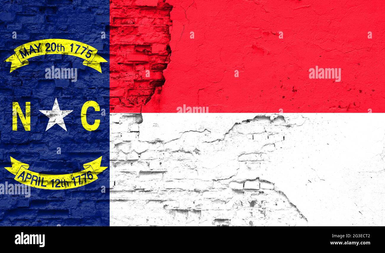 State of North Carolina flag is painted onto an old brick wall Stock ...