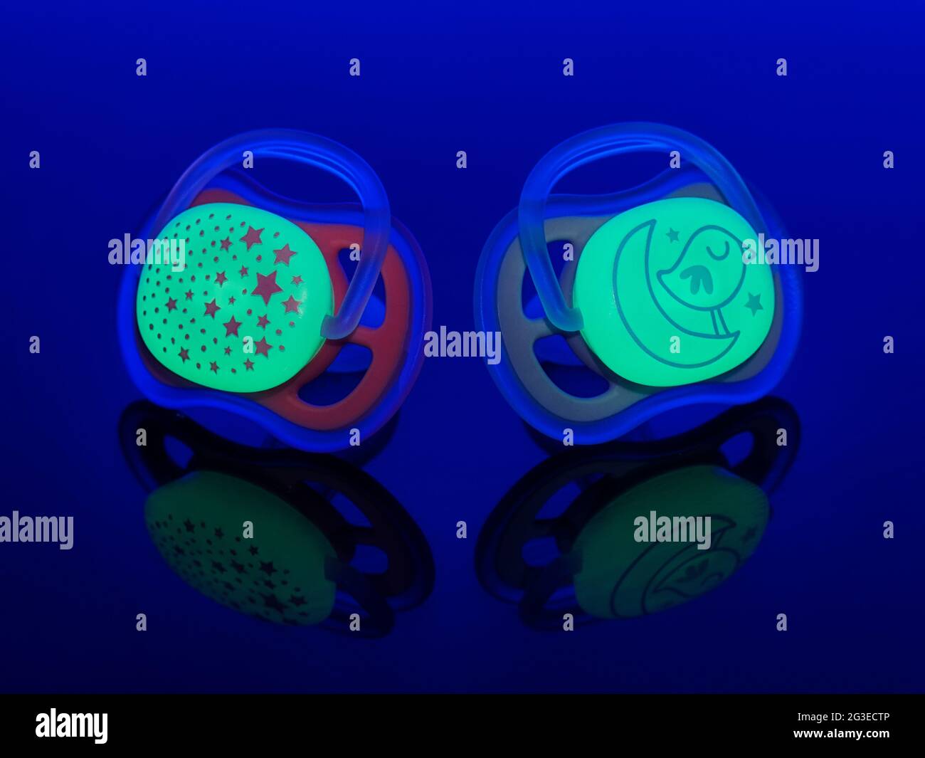 Glow in the dark, pink and blue pacifiers for toddlers. Easy to find ...