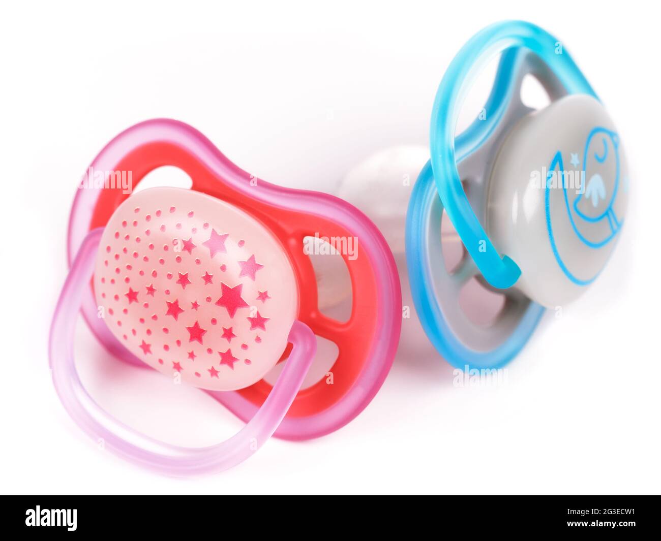 Pink and blue pacifiers for toddlers. isolated on white background ...