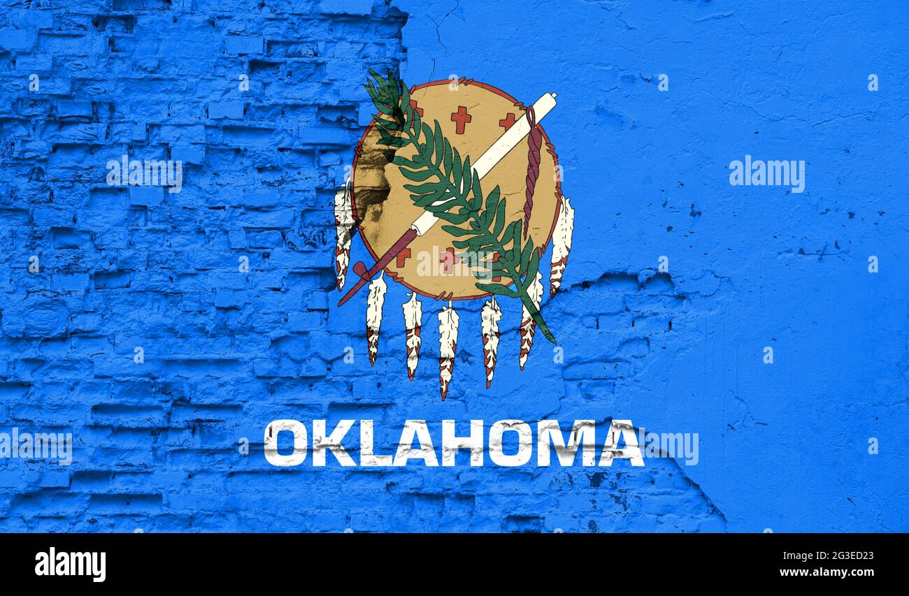 State of Oklahoma flag is painted onto an old brick wall Stock Photo ...