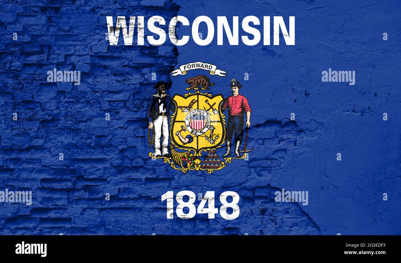 State of Wisconsin flag is painted onto an old brick wall Stock Photo ...