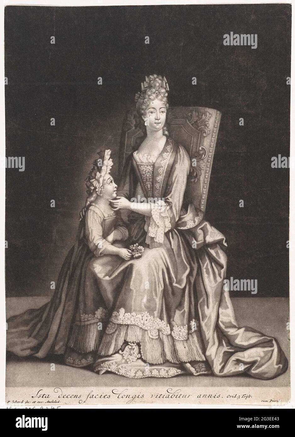 Woman sitting on a chair with a young girl next to her; Ista Decens ...