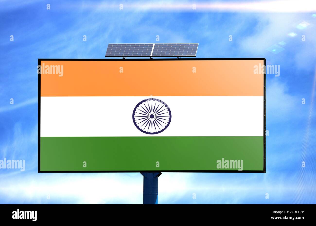 Billboard with India flag and solar battery on blue sky background ...