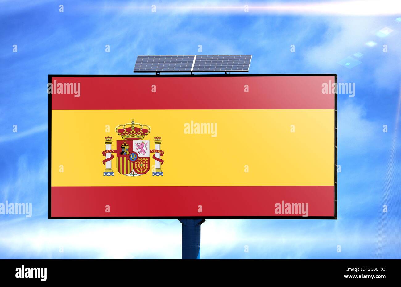 Billboard with Spain flag and solar battery on blue sky background ...