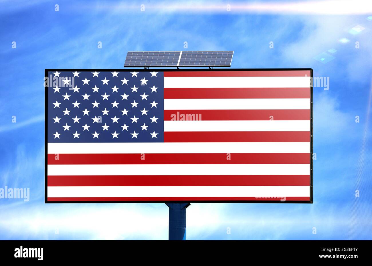 Billboard with America flag and solar battery on blue sky background ...