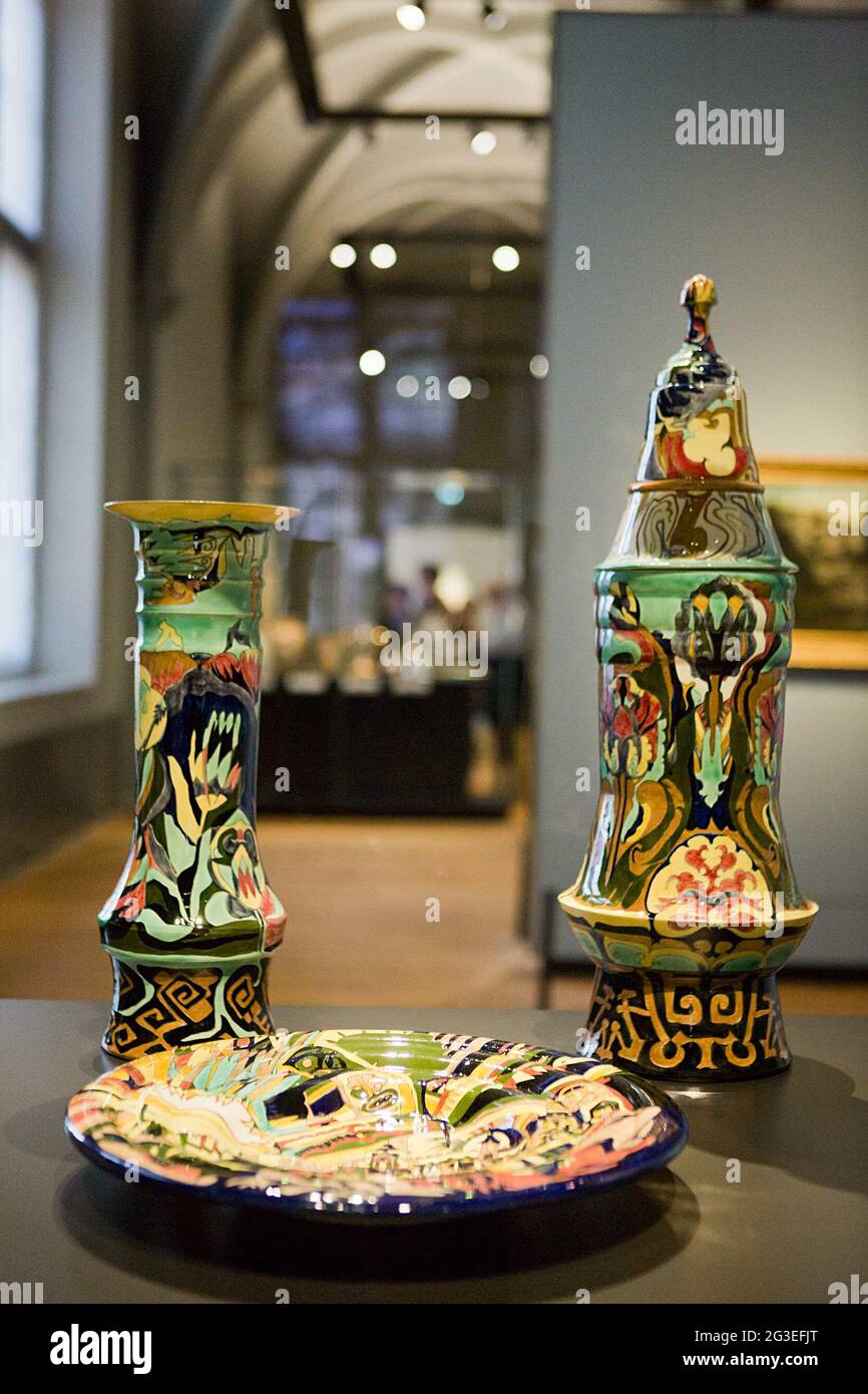 Two vases and a sign designed by Theo Colenbrander on the 1800-1900 ...