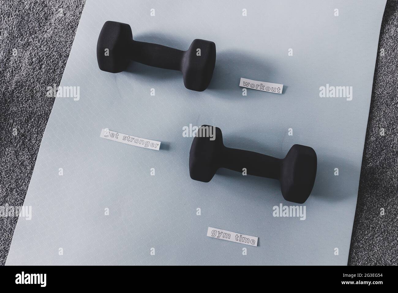 home gym and exercising in your spare time, dumbbell on yoga mat on ...