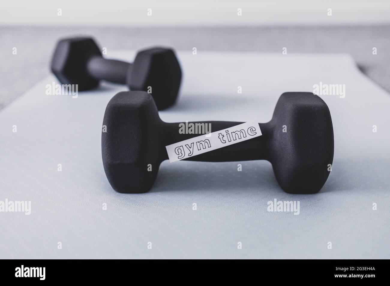 home gym and exercising in your spare time, dumbbell on yoga mat on ...