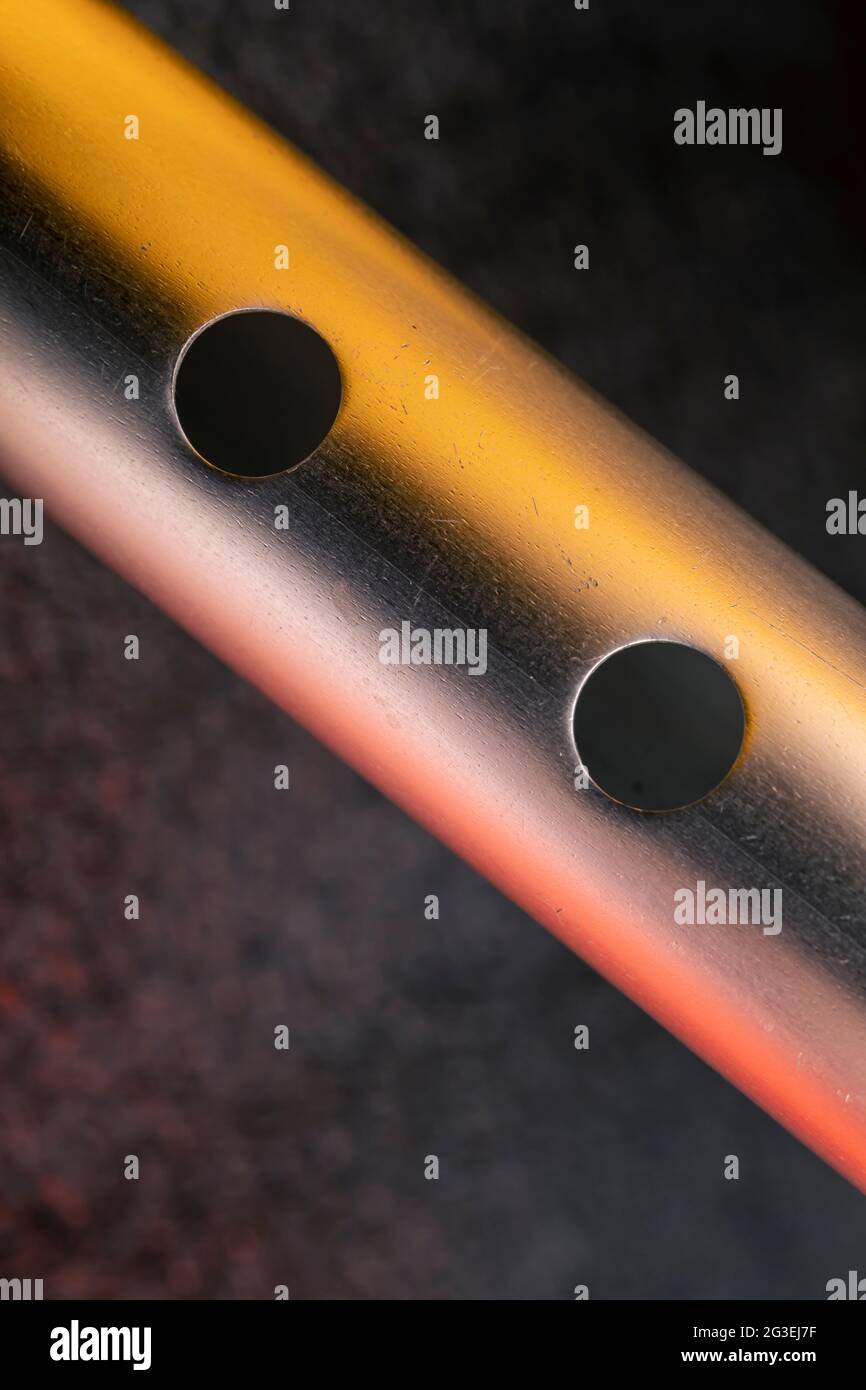 Steel or Aluminum pipe with fixing holes. Metal pipe closeup Stock ...