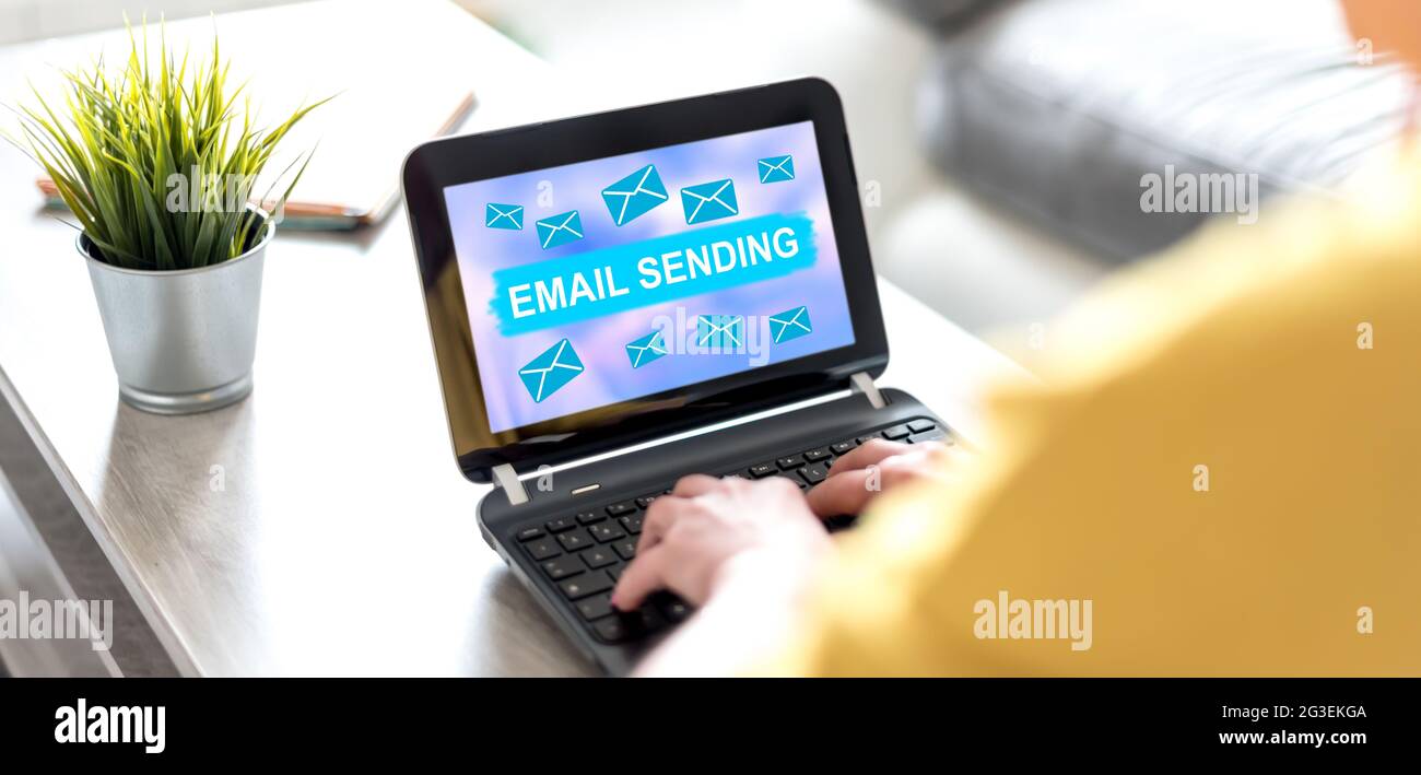 Laptop screen displaying an email sending concept Stock Photo - Alamy