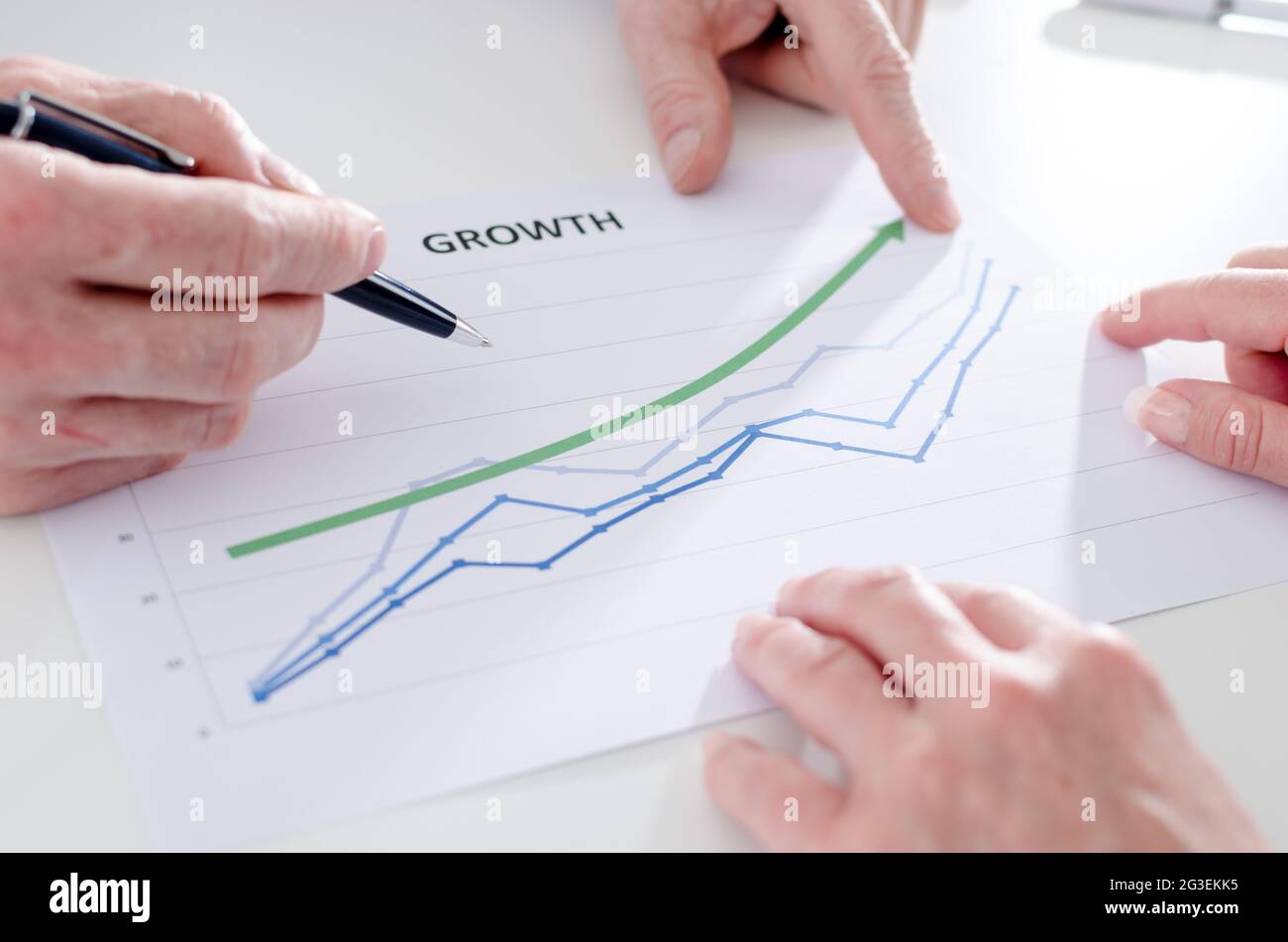 Analyzing growing results on a graphic Stock Photo - Alamy