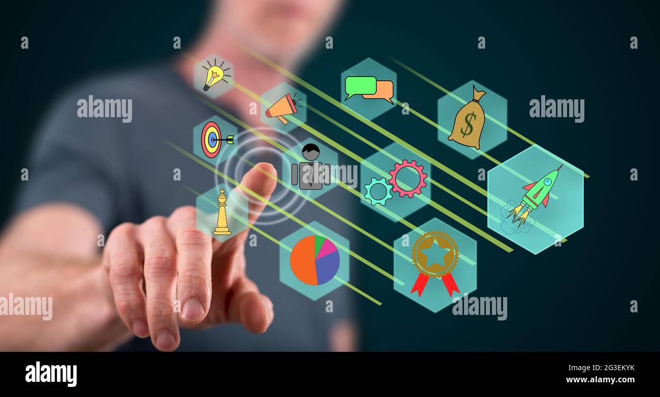 Man touching a business strategy concept on a touch screen with his ...