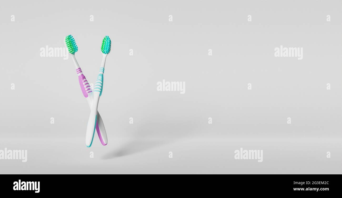 toothbrushes floating in the air on white background with space for ...