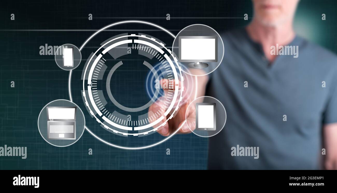 Man touching a device connection concept on a touch screen with his ...