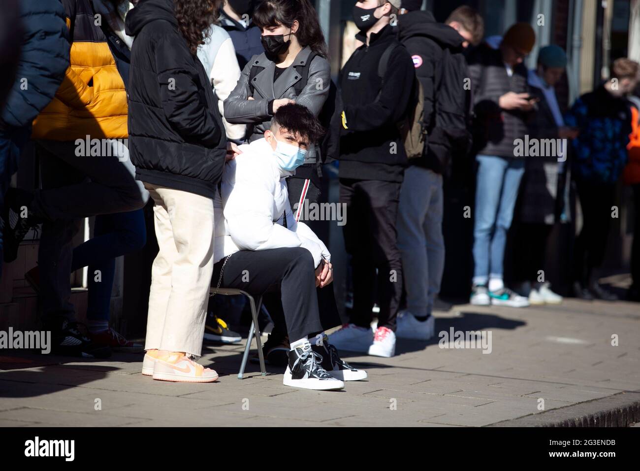 Young people queue waiting for the doors to re-open outside ‘Size ...