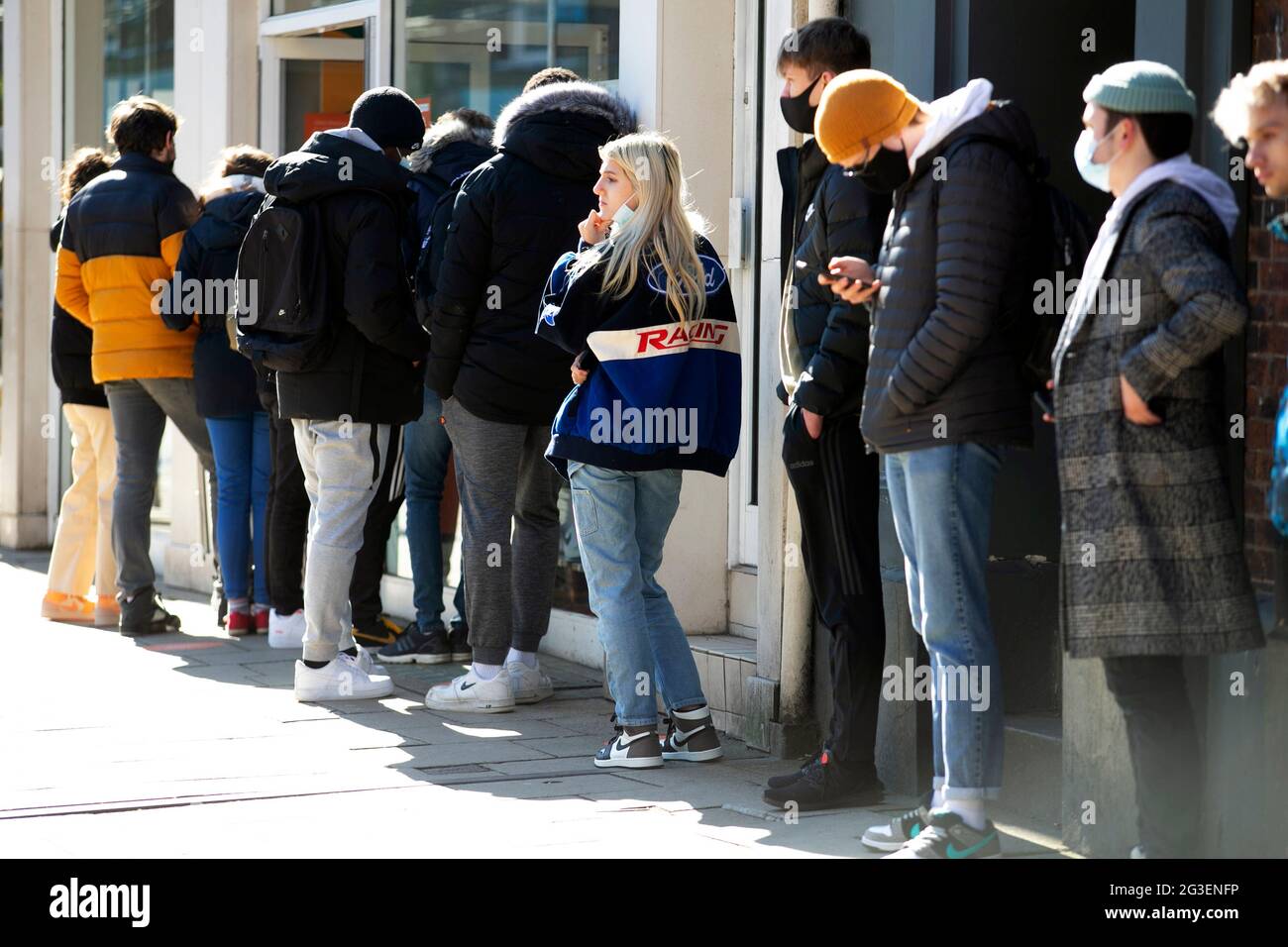 Young people queue waiting for the doors to re-open outside ‘Size ...
