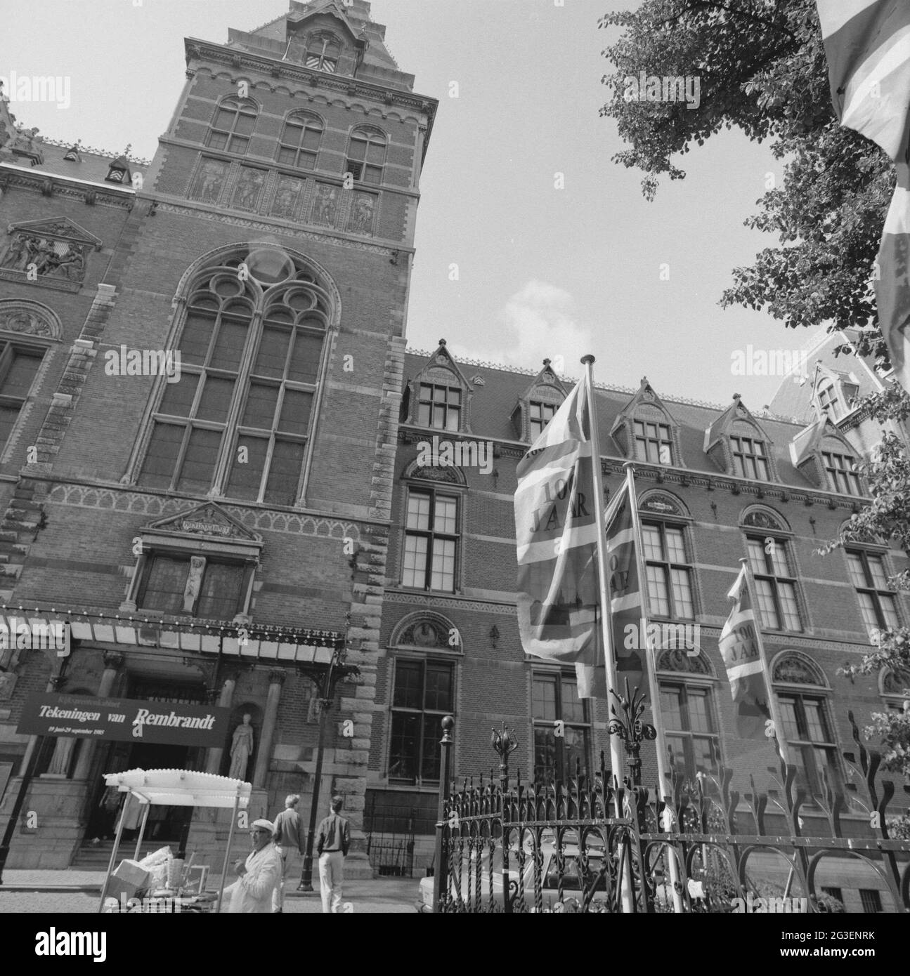 Entrance with panel on which the exhibition title is drawings of ...