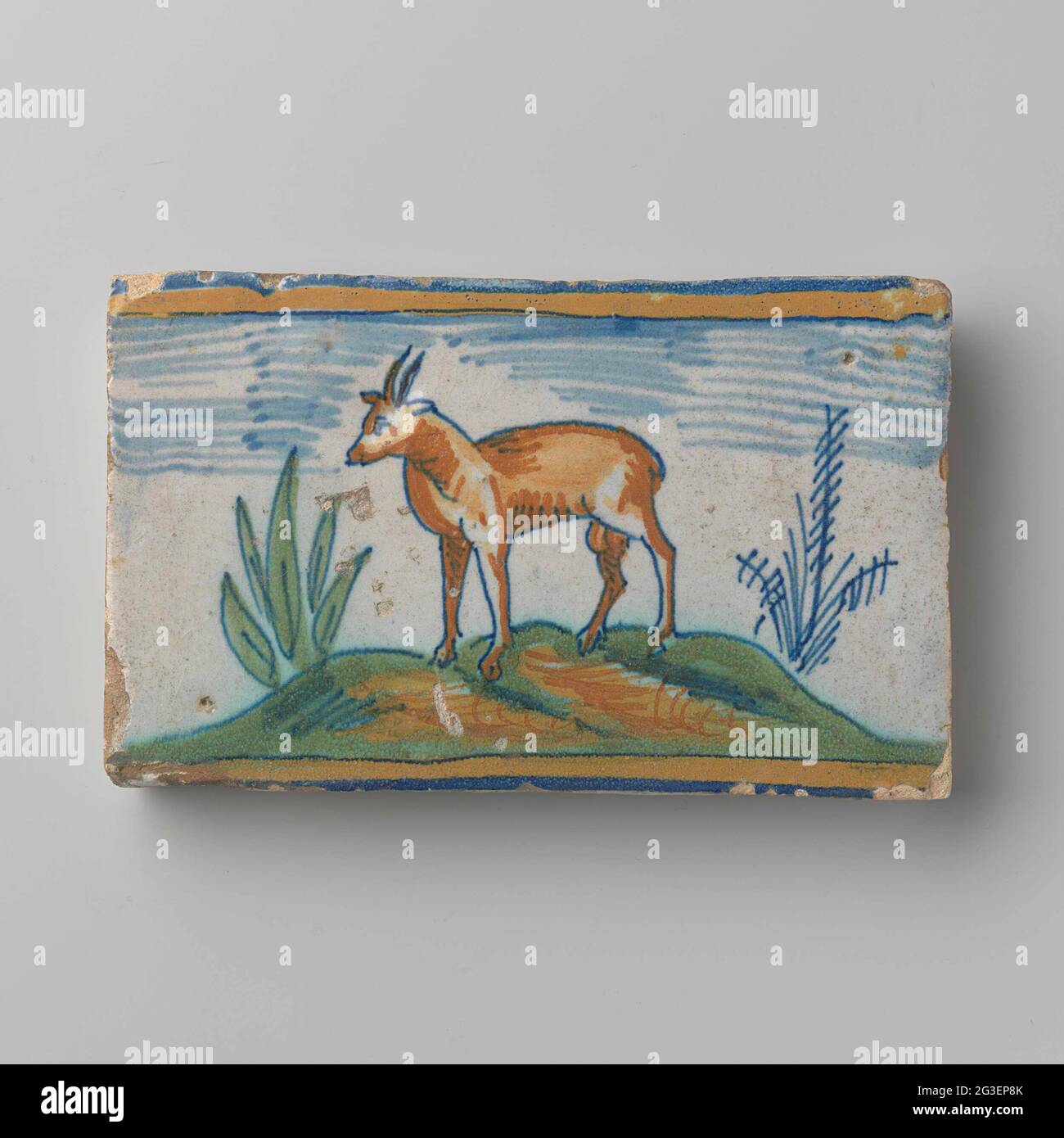 Edge tile with animal. Edge tile with a multi-colored (blue, green ...