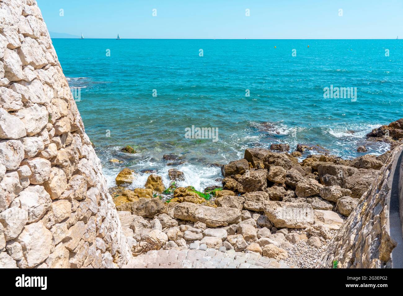 Fortress and a staircase made from stones, going into the sea. Many big ...