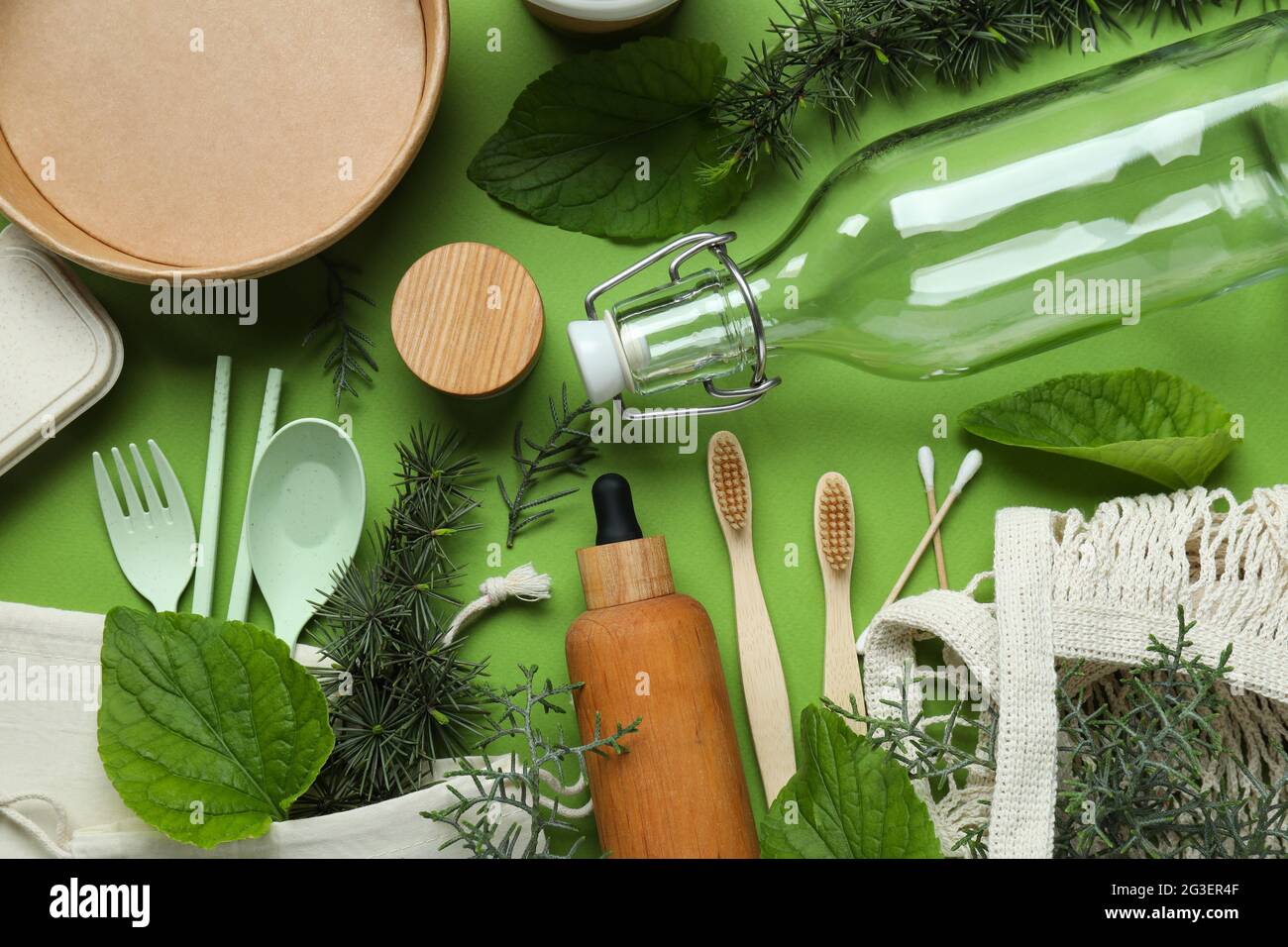 Eco friendly zero waste concept on green background Stock Photo - Alamy