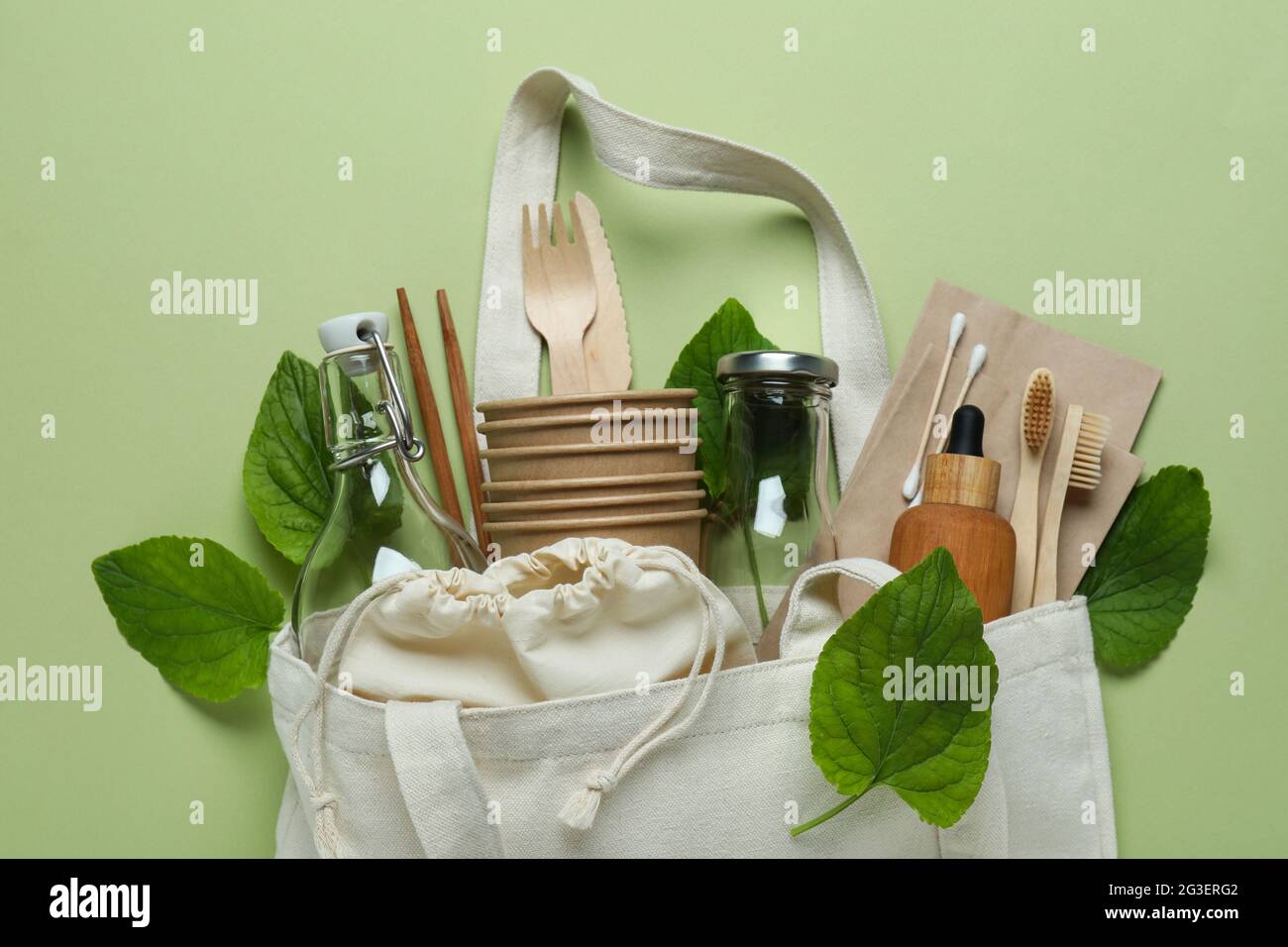 Eco friendly zero waste concept on green background Stock Photo - Alamy