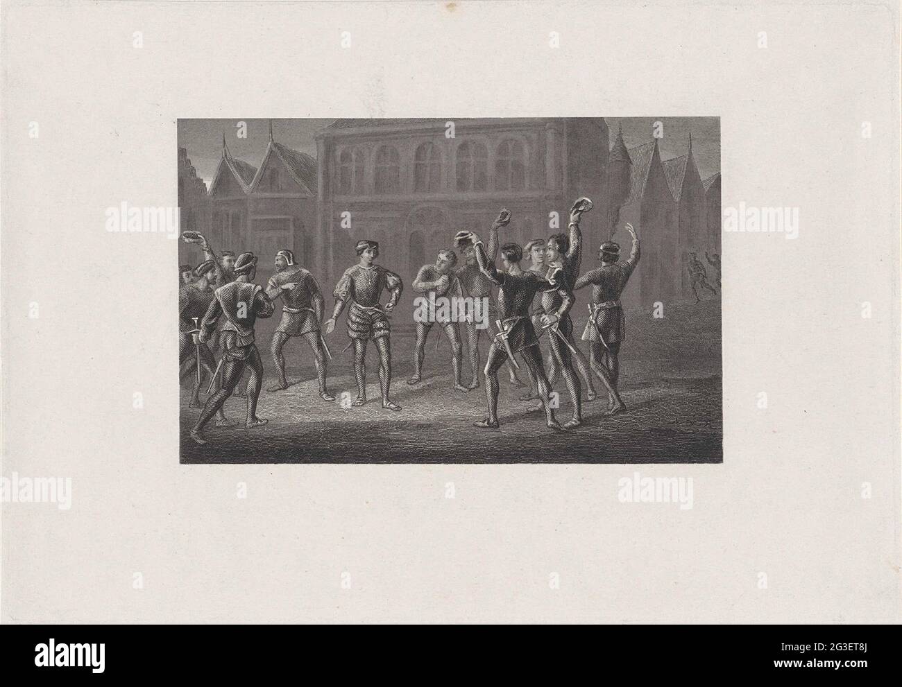 Juichende young men. A group of young men, possibly students, comes together on a square. They ...