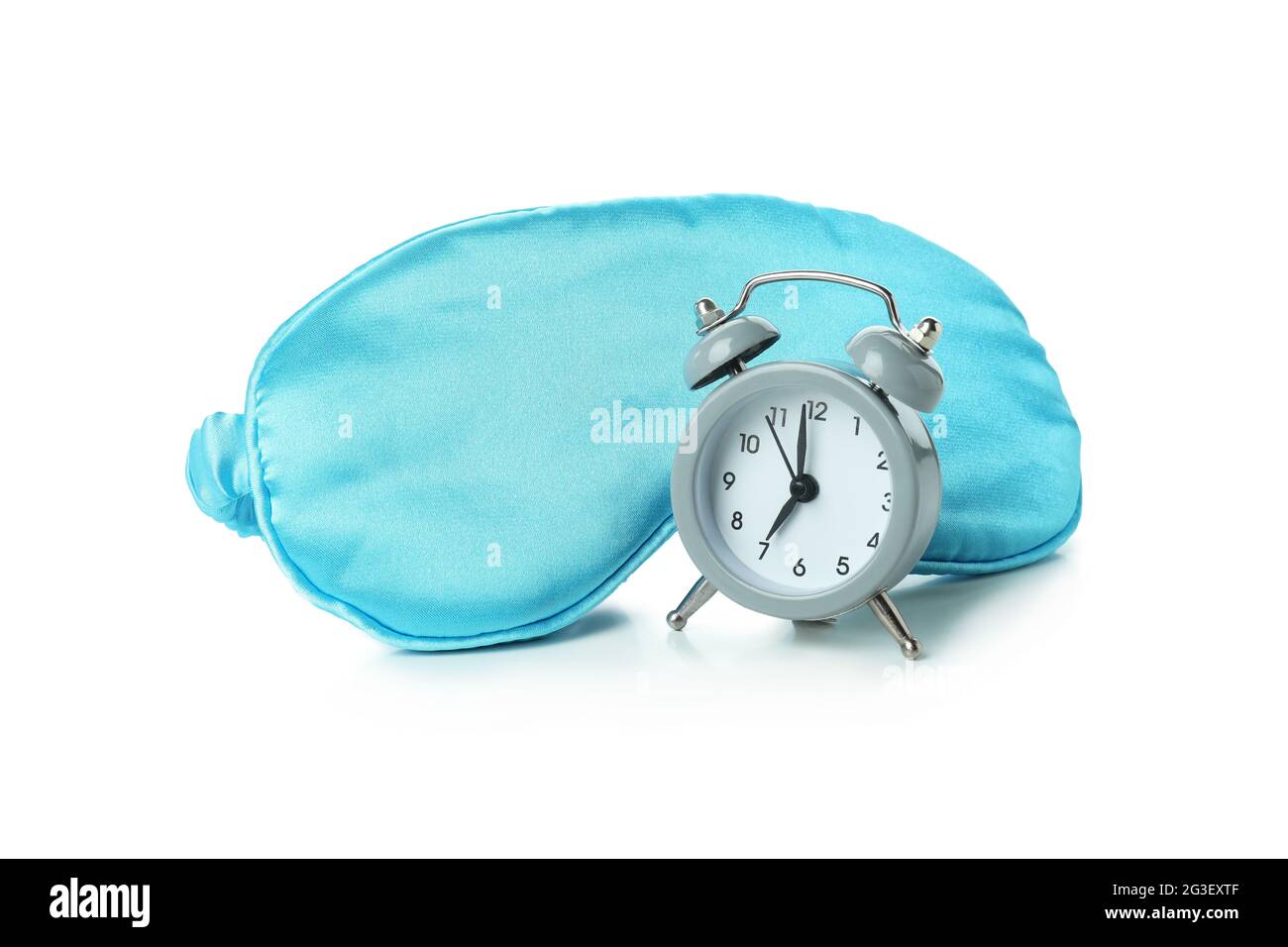 Sleep mask and alarm clock isolated on white background Stock Photo - Alamy