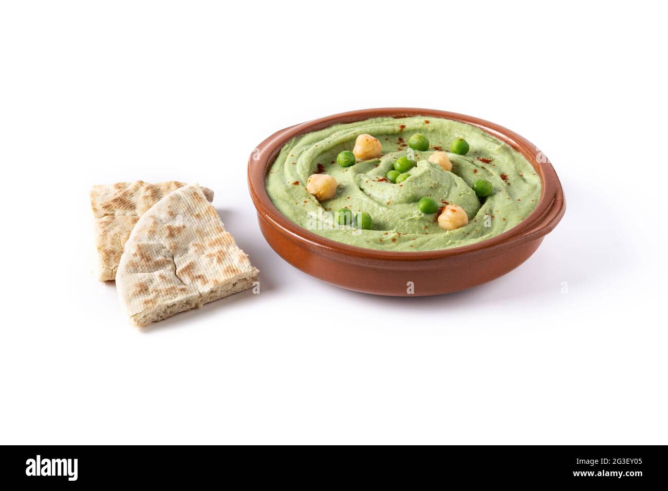 Green pea hummus isolated on white background Stock Photo - Alamy