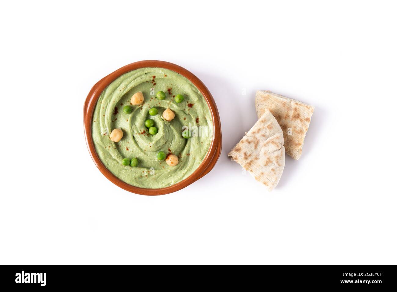 Green pea hummus isolated on white background Stock Photo - Alamy