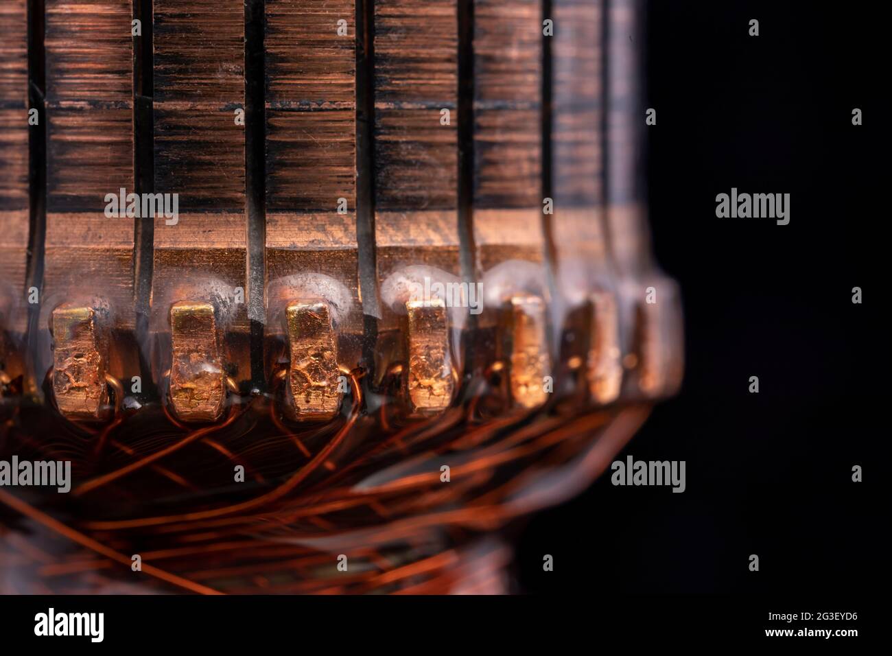Copper commutator bar of the electric motor close up. Electric motor ...