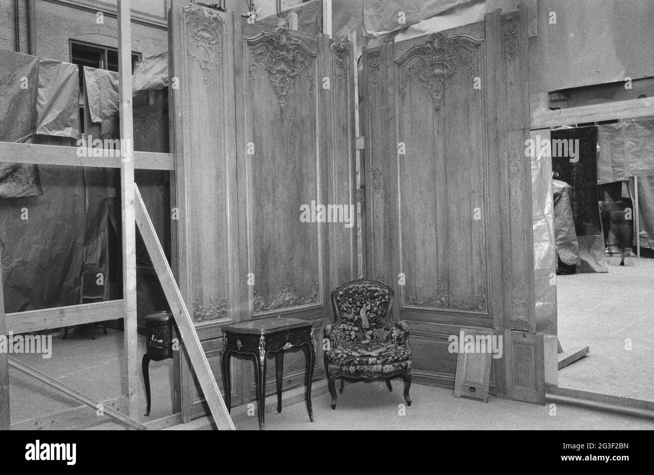 Paneling with table and armchair; Trial setups Western courtyard ...