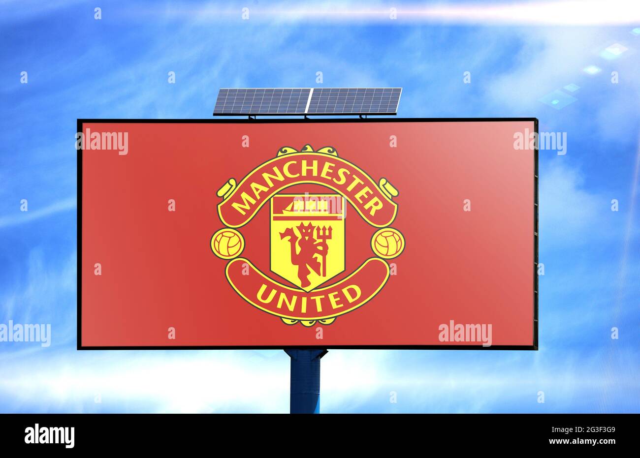 Billboard with Manchester United Football Club flag and solar battery ...