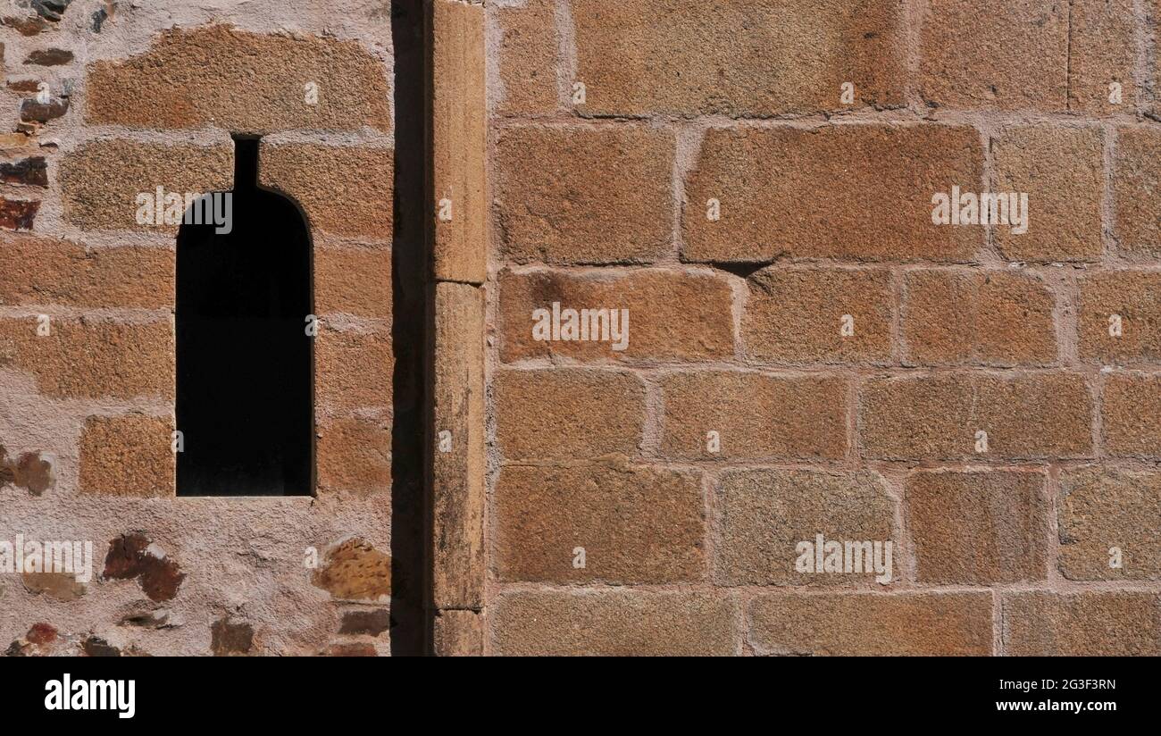 Window on a stone wall of a medieval building Stock Photo - Alamy