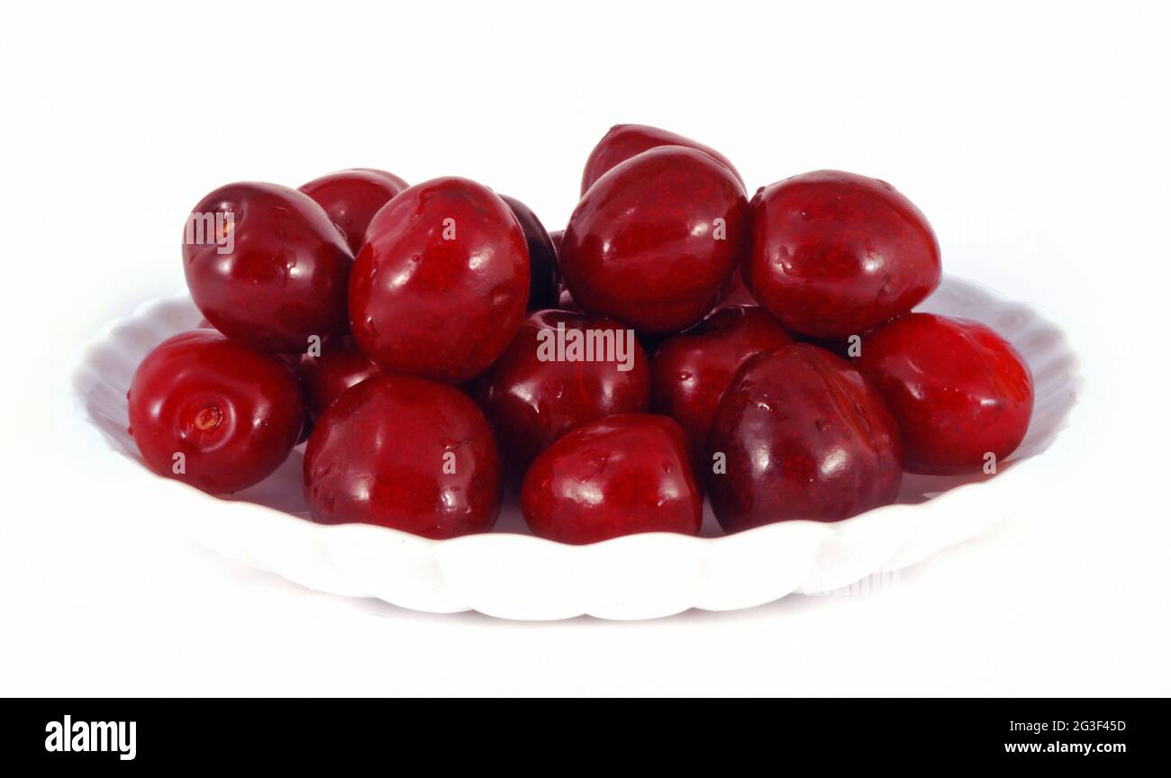 Fresh delicious cherries water Cut Out Stock Images & Pictures - Alamy