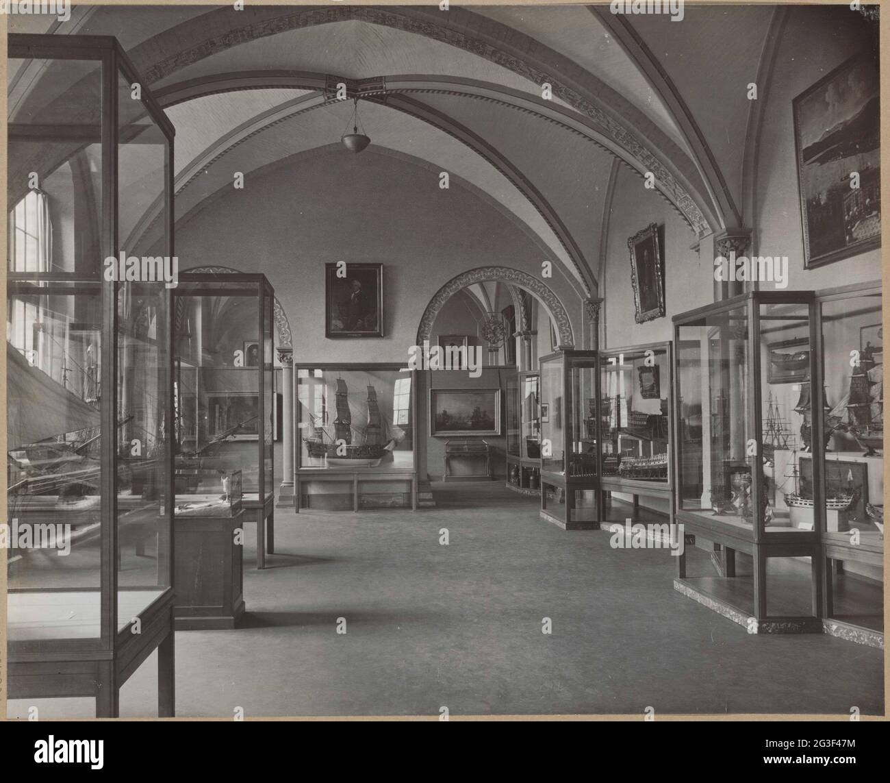 Model room with paintings and ship models in display cabinets Stock ...