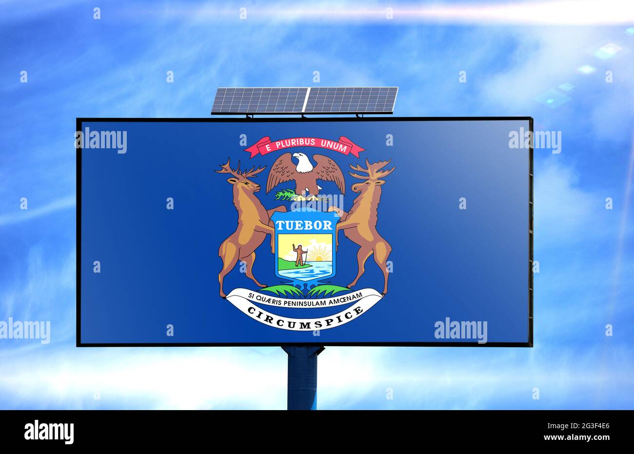 Billboard with State of Michigan flag and solar battery on blue sky ...