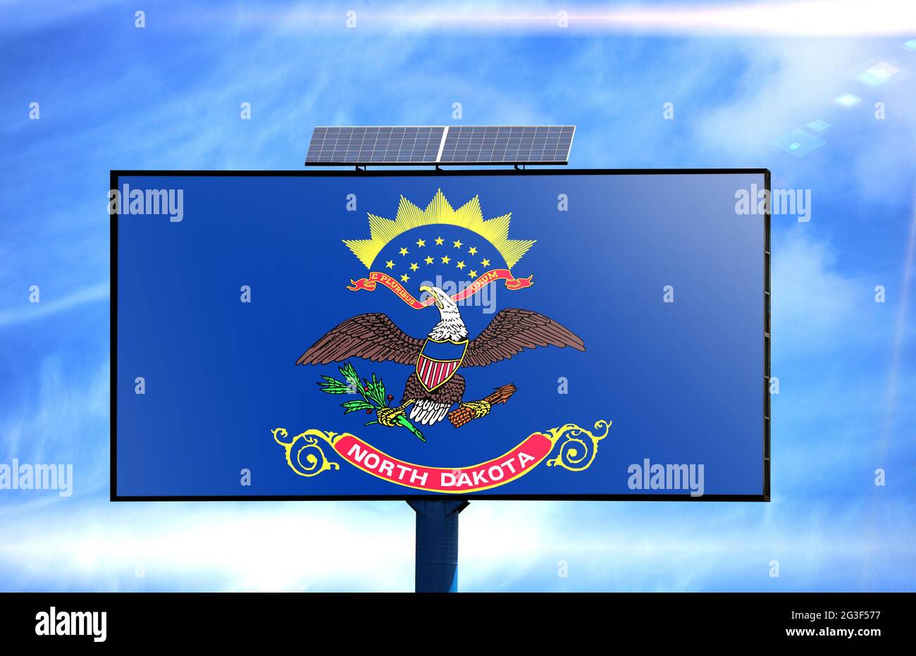 Billboard with State of North Dakota flag and solar battery on blue sky ...