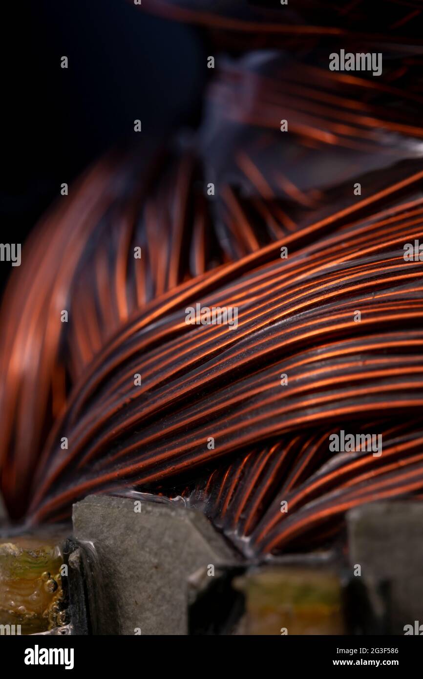Rotor of an electric motor close up. Copper motor windings Stock Photo ...