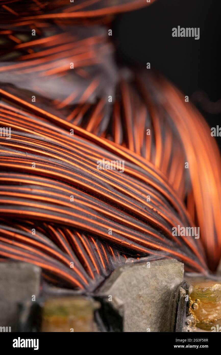 Rotor of an electric motor close up. Copper motor windings Stock Photo ...