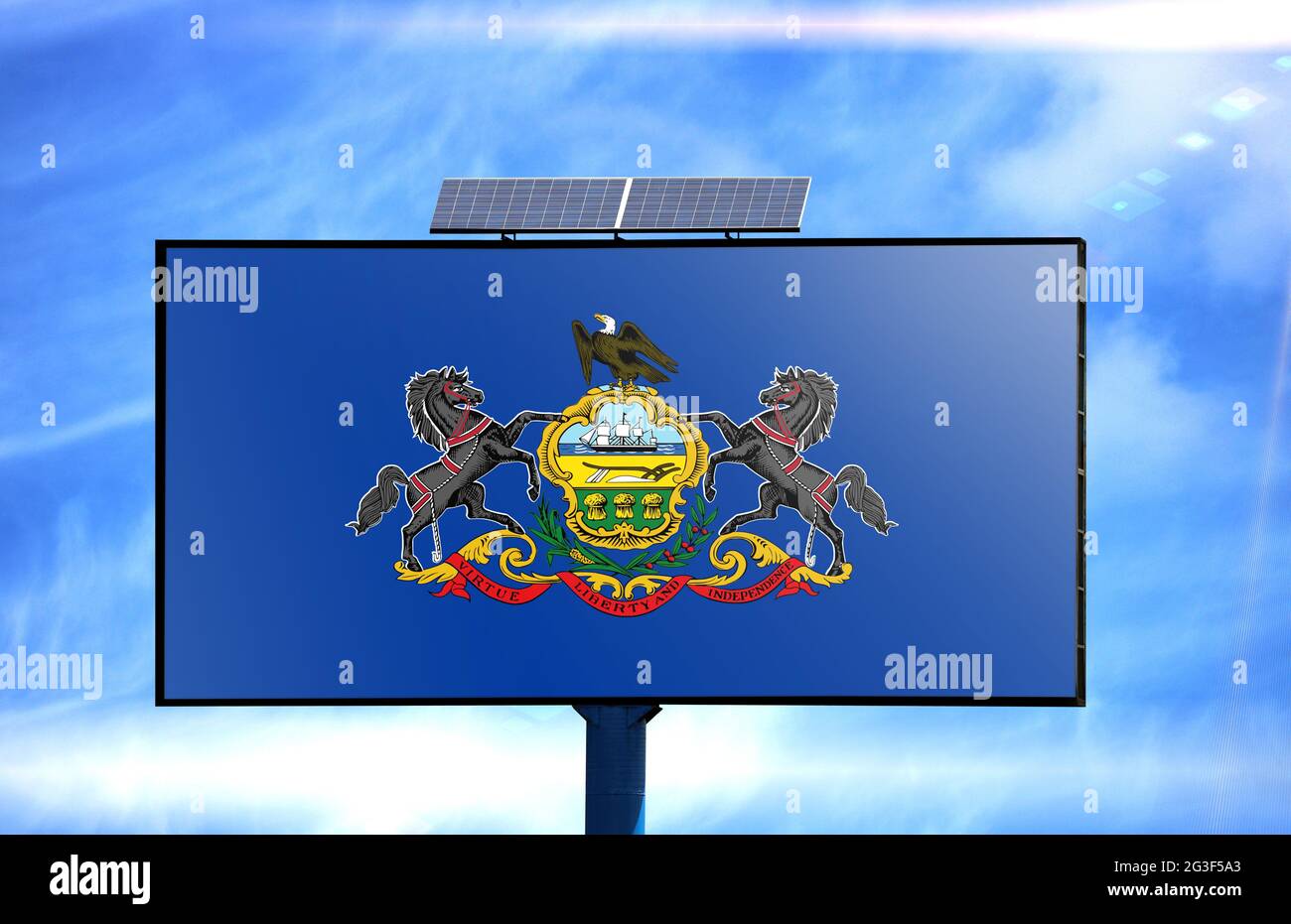 Billboard with State of Pennsylvania flag and solar battery on blue sky ...